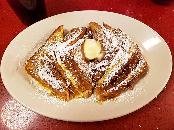 French toast that makes you question every other breakfast you've ever had. That powdered sugar snowfall is winter weather we can all appreciate.