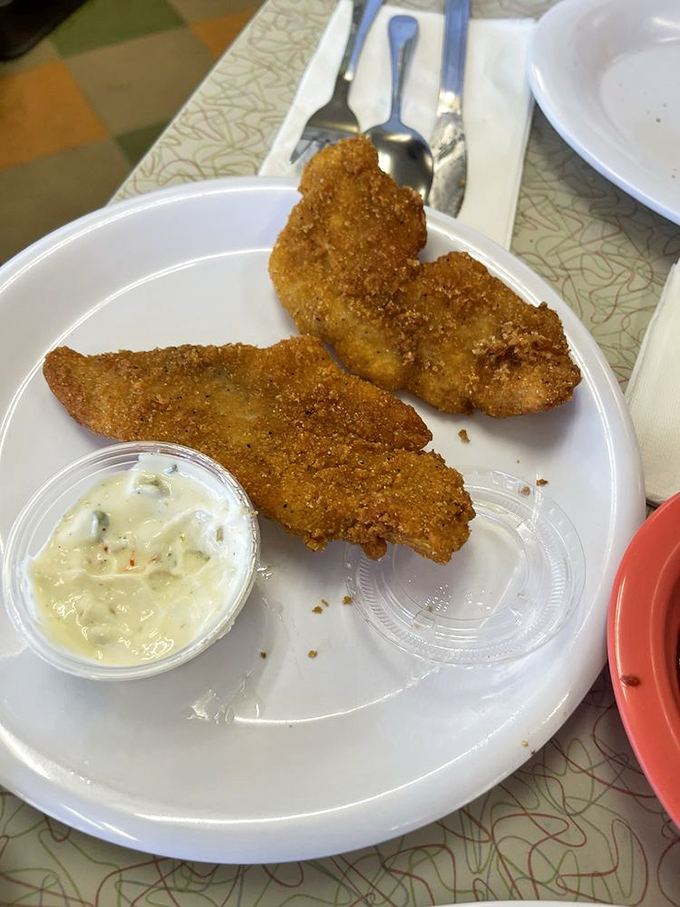 Crispy catfish strips with homemade tartar sauce&mdash;Southern seafood simplicity that makes you wonder why anyone would bother with fancy restaurants.