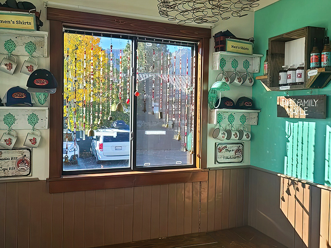 Merchandise corner with a view! The Stove's mint-green walls and branded mugs let you take a piece of breakfast paradise home.