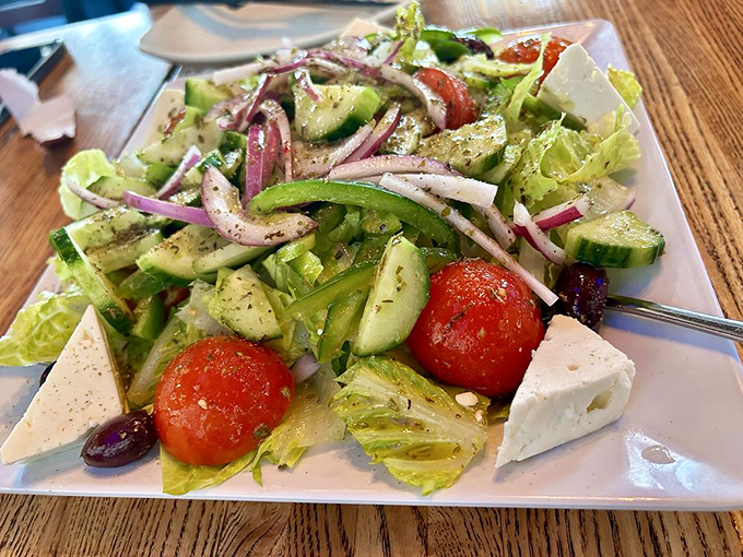 A Greek salad that actually respects vegetables&mdash;crisp, colorful, and adorned with feta chunks so generous they deserve their own zip code.