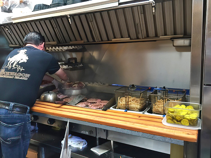 The heart of the operation. This well-seasoned grill has probably seen more breakfast action than most of us have had hot meals.