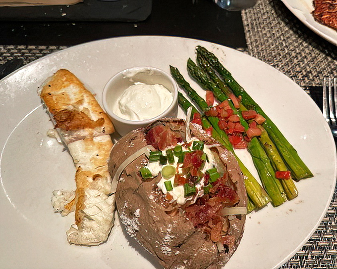 This halibut special arrives with artistic presentation that proves seafood can be both elegant and satisfying simultaneously.