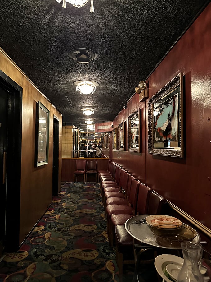 The hallway to HOBNOB's dining room feels like a portal to the 1960s, when martinis were dry, steaks were thick, and dining was an art form.