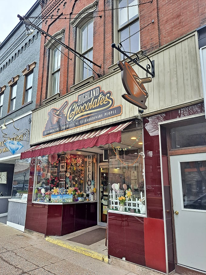 Highland Chocolates' whimsical storefront promises sweet treasures inside, where calories don't count because you're technically on vacation.