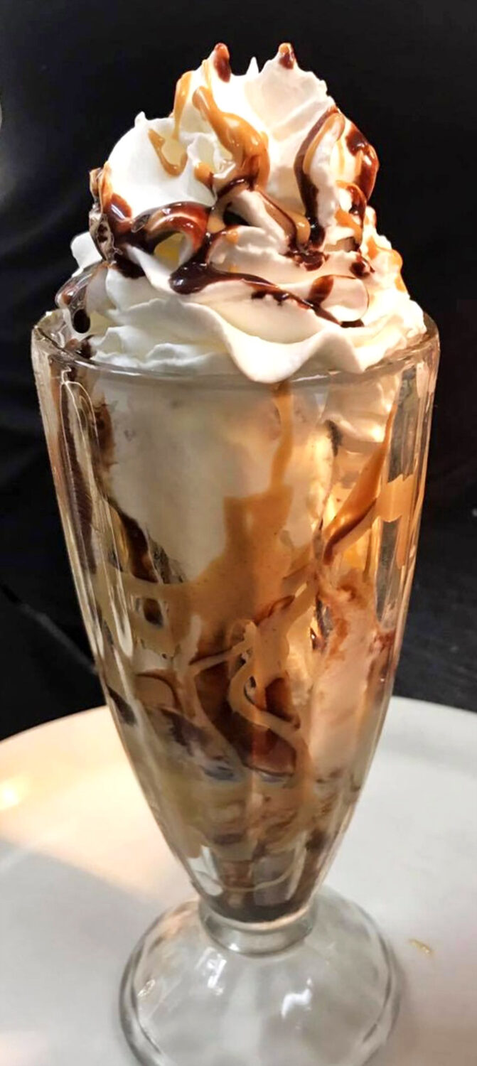 This ice cream sundae doesn't just satisfy your sweet tooth&mdash;it throws a party for it, complete with caramel confetti and whipped cream mountains.