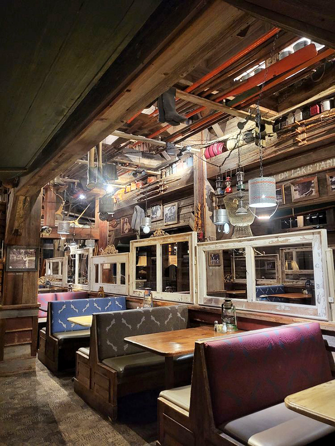 Booth seating that feels like you've wandered into someone's very cool fishing cabin. Those hanging lights weren't designed&mdash;they evolved.