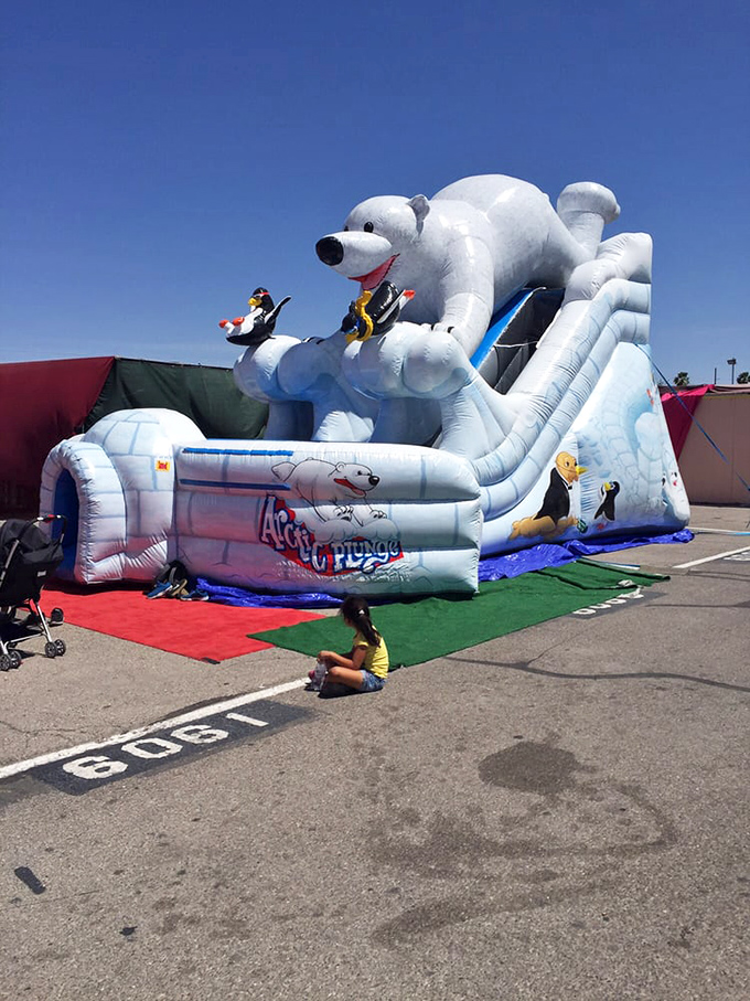 The polar bear slide: where kids burn off energy while parents contemplate one more lap through the marketplace.