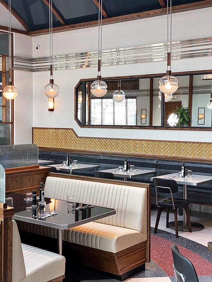 Cozy booths bathed in warm lighting invite lingering conversations and the inevitable "should we order dessert?" debate (spoiler: the answer is always yes).