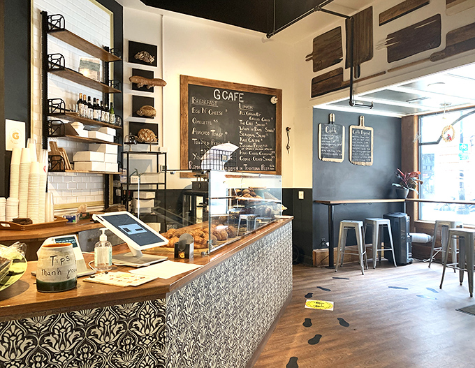 The counter where magic happens: part bakery, part social hub. That patterned tile front isn't just pretty&mdash;it's the gateway to carbohydrate heaven.