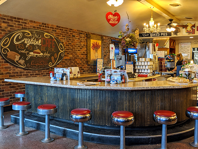 The elegant simplicity of Crystal Cafe's interior design proves that chandeliers and brick walls are the perfect backdrop for serious comfort food consumption.