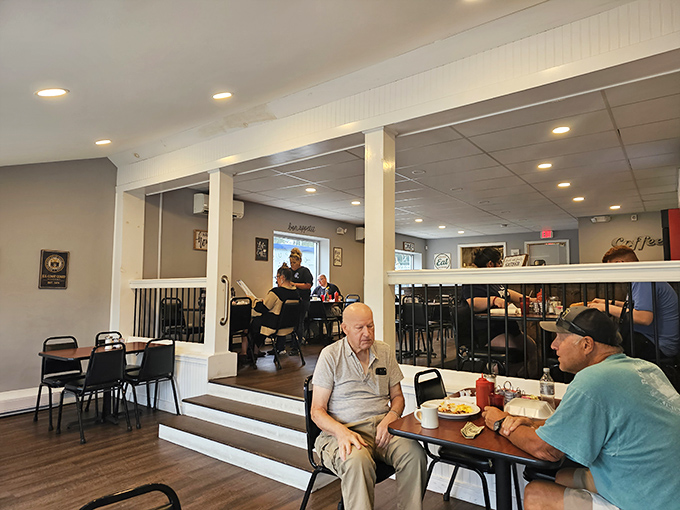 The elevated dining area creates a breakfast theater where regulars become the stars of their own morning show.