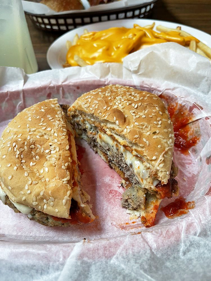 Half-eaten because waiting to take a photo was simply impossible. This Italian-inspired burger creation proves that patience is overrated when hunger calls.