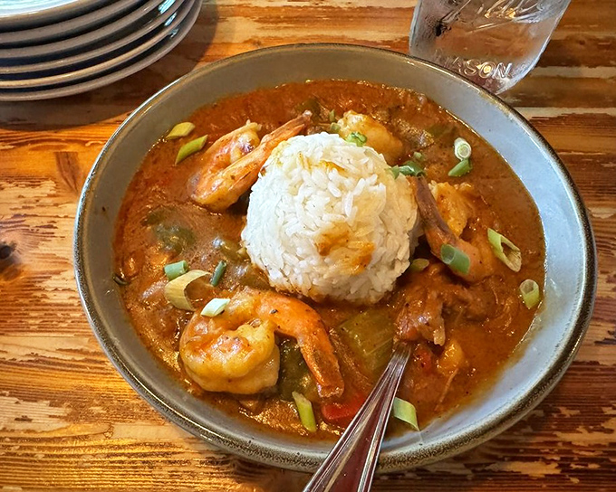Jambalaya that's having a party and invited shrimp, sausage, and vegetables. That island of rice in spicy stew is begging for your spoon.