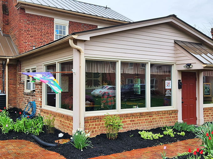 James Burke House Eatery's sunroom dining area looks like the perfect spot to enjoy lunch while pretending you're in your fancy friend's home.
