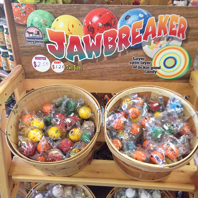Jawbreakers stacked in rustic baskets promise hours of tongue-numbing commitment. These colorful spheres are the marathon runners in a world of sprint-eating candy.