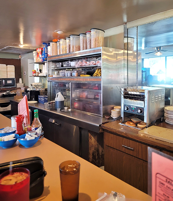 The kitchen pass – where breakfast dreams come true and the choreography of short-order cooking unfolds with practiced precision.