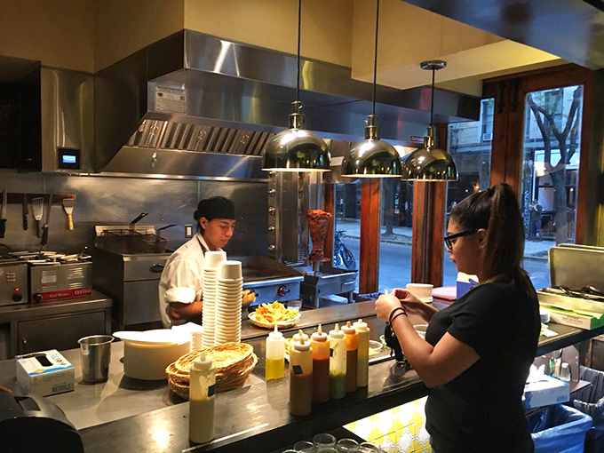 Where the magic happens. Those squeeze bottles contain sauces that could make cardboard taste like a delicacy.