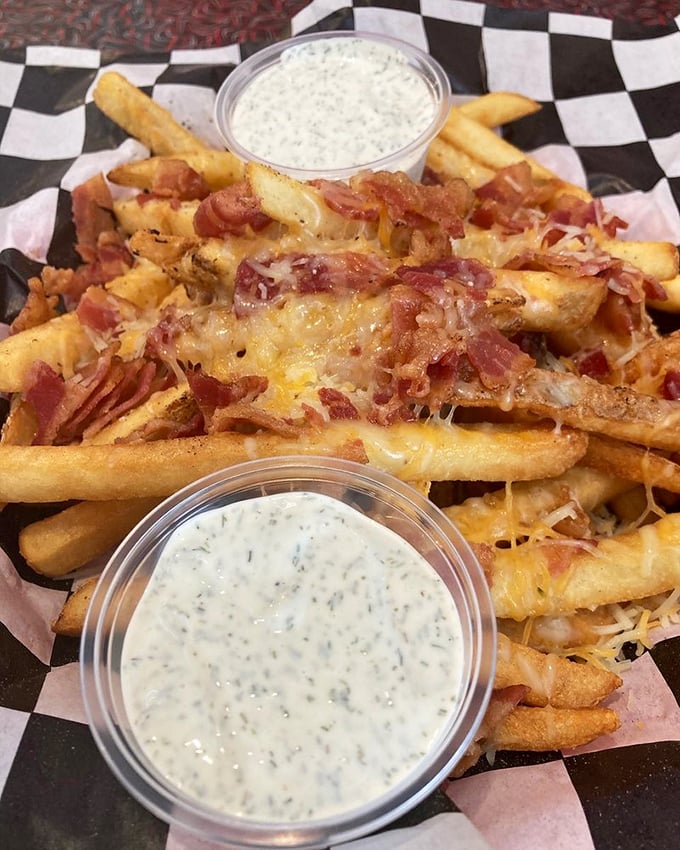 Loaded fries that require a game plan: crispy potatoes smothered in melted cheese and bacon with ranch dipping sauce for that extra touch of indulgence.