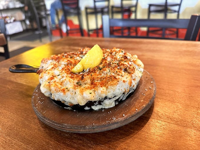 This crab dish isn't just a meal&mdash;it's a seafood celebration on a wooden pedestal where it rightfully belongs.