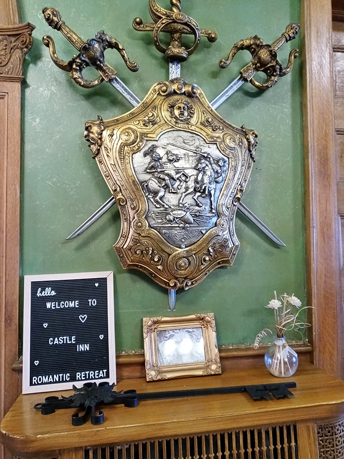 Medieval weaponry arranged with artistic flair&mdash;this decorative shield and sword display proves knights had a flair for interior design.