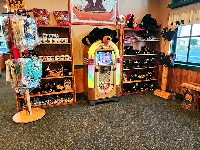 The gift shop corner offers bear-themed souvenirs and a vintage jukebox, because nothing says "I conquered breakfast" like a stuffed bear memento.