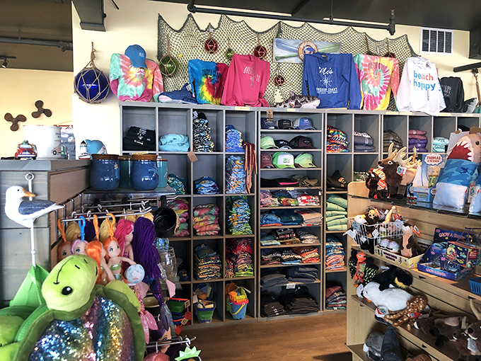 The gift shop: where "I'll just look around" becomes "I need this beach-happy shirt and that stuffed sea creature immediately."