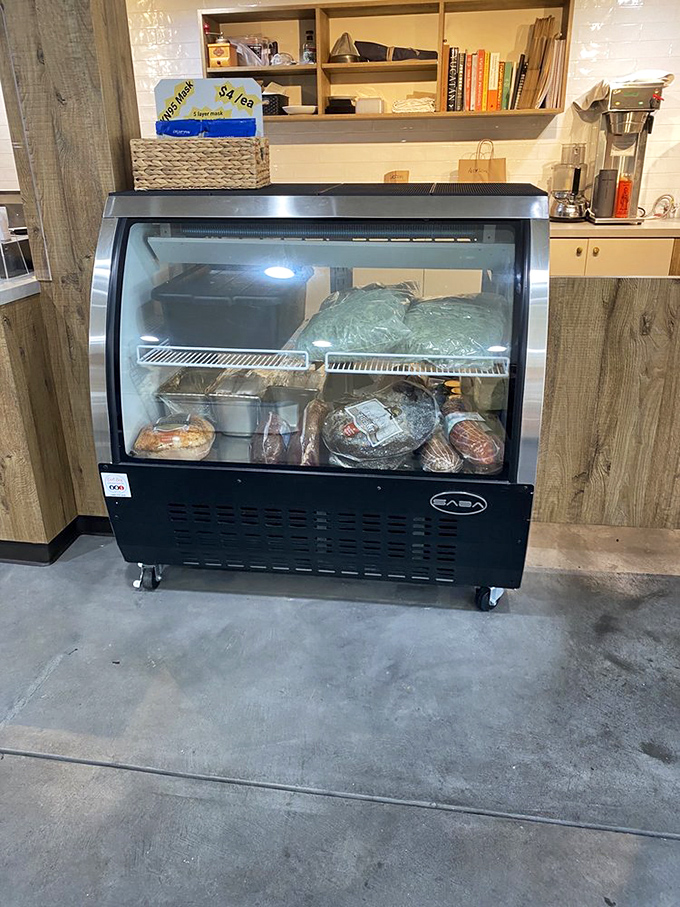 Behind this glass lies sandwich magic. The deli case holds the building blocks of greatness, waiting to be transformed by skilled hands.