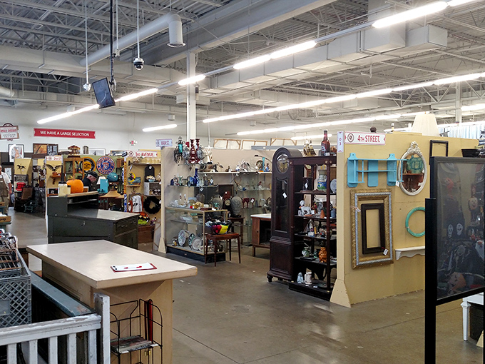 Antique mirrors reflect decades of stories while vintage furniture waits patiently for new homes and adventures.