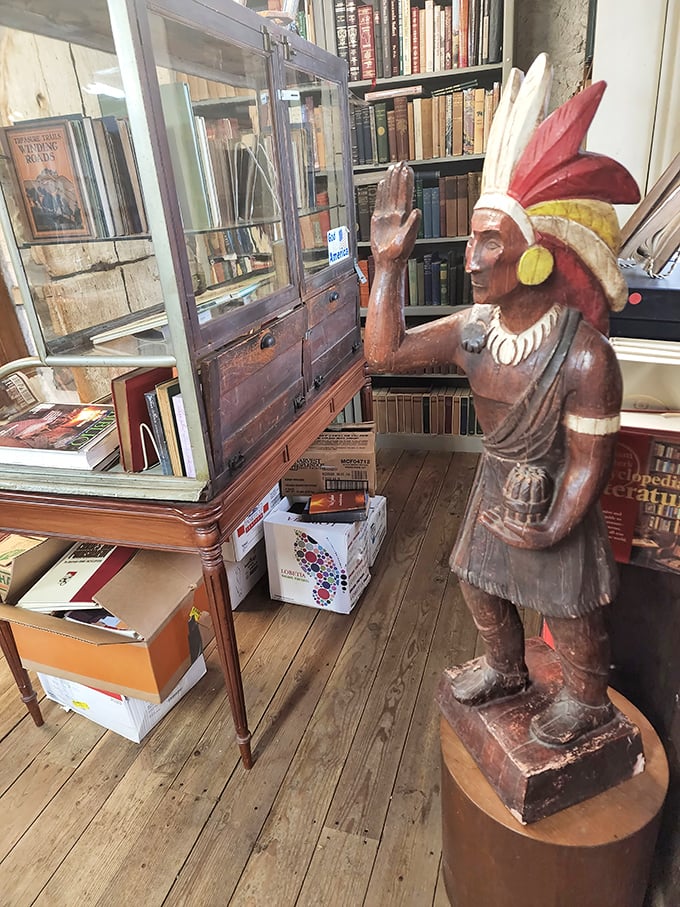 Even the decorative elements tell stories here. This wooden sentinel stands guard over centuries of collected wisdom.