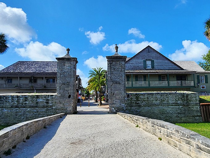 The ancient coquina pillars of the Old City Gates have welcomed visitors for centuries, standing as silent sentinels to St. Augustine's enduring charm.