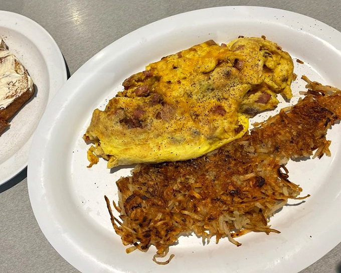 That perfect omelet-hashbrown relationship—like a breakfast buddy comedy where both stars get equal billing and critical acclaim.