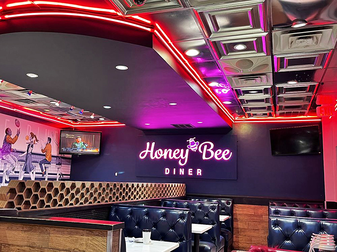 The Honey Bee's interior glows with that perfect diner ambiance &ndash; where neon meets nostalgia and calories don't count if you're sitting in a booth.