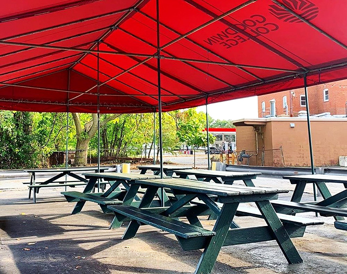 The outdoor patio &ndash; where picnic tables under a red canopy create the perfect summer setting for enjoying those legendary fries. 