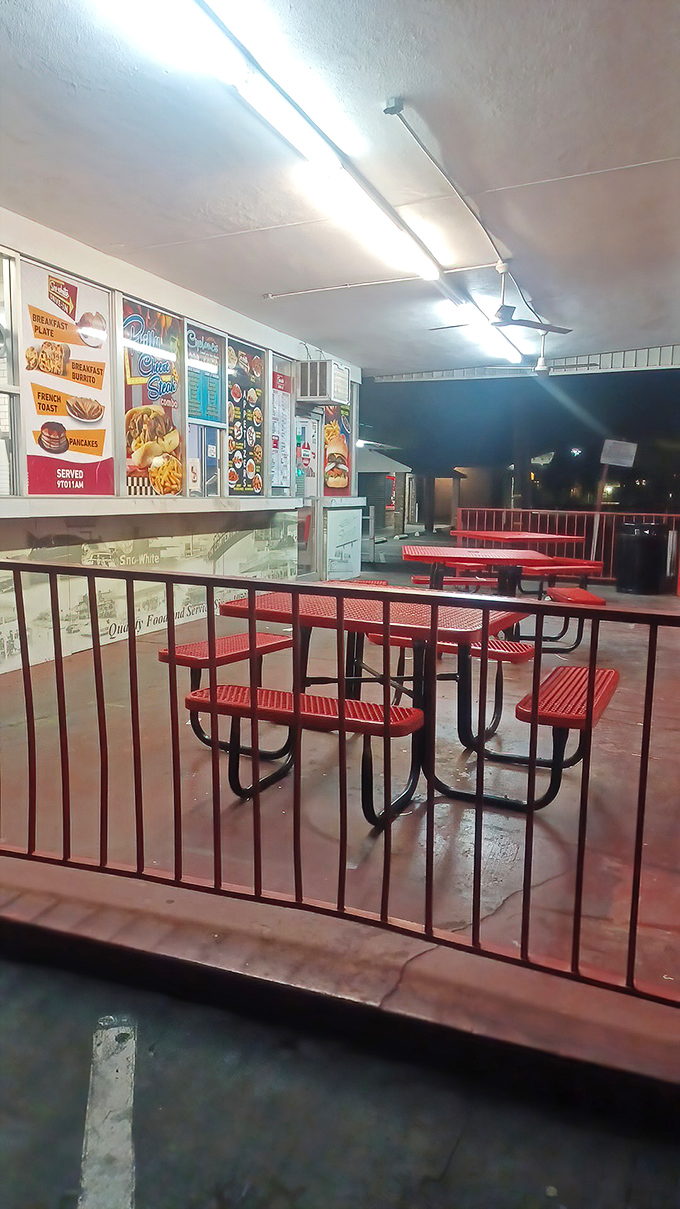 Red picnic tables under the stars&mdash;where summer nights and comfort food create memories that last longer than the meal.