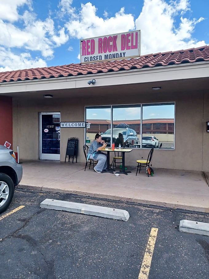 Albuquerque's blue skies provide the perfect canopy for an impromptu outdoor meal at Red Rock Deli. Even the sign reminds you to plan accordingly!