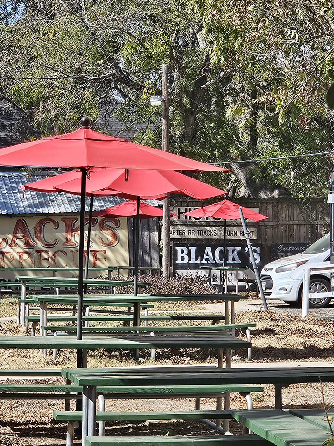 Al fresco dining, Texas-style. Those red umbrellas provide shade for serious contemplation of life's important questions, like "Should I order seconds?"