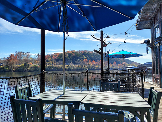 Mother Nature provides the backdrop while blue umbrellas frame the perfect outdoor dining experience. Lake views included at no extra charge.