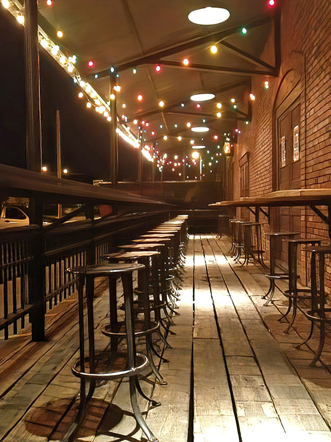 The outdoor deck strung with twinkling lights creates the perfect atmosphere for evening dining. Nautical romance under Oklahoma stars.