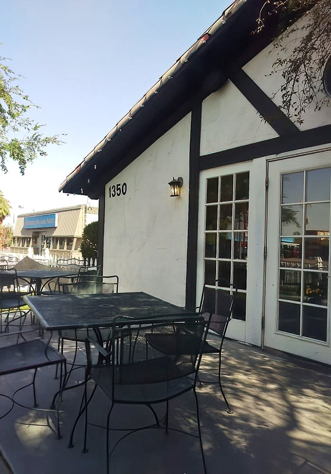 The outdoor patio offers desert sunshine with your bangers and mash. British tradition meets Nevada climate in perfect, shade-dappled harmony.