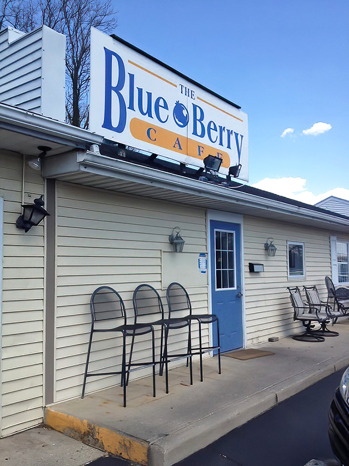 The blue door and simple exterior sign announce you've arrived at breakfast nirvana&mdash;those outdoor chairs ready for patient pilgrims awaiting their turn. 