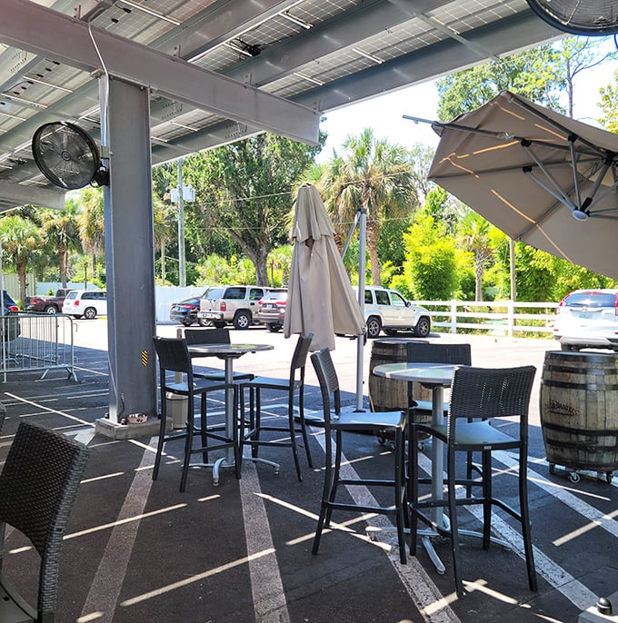 Florida's natural beauty becomes the backdrop for alfresco dining, where umbrella-shaded high-tops offer respite from the sunshine state's namesake.