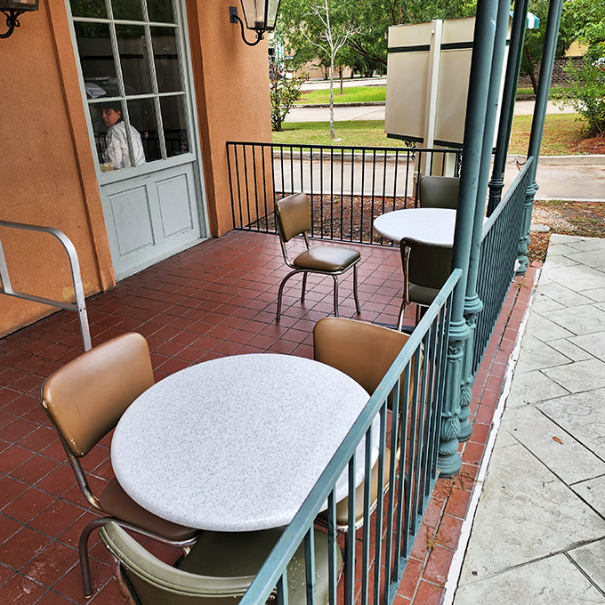 The outdoor seating area offers prime people-watching with your powdered sugar fix. Just don't wear black unless you're making a fashion statement.