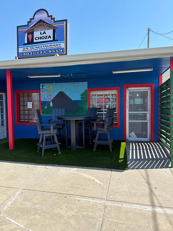 La Choza's vibrant blue exterior with outdoor seating is like finding a colorful postcard from Central America right in the heart of Omaha.