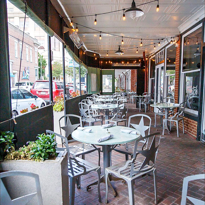 Outdoor seating that captures Roanoke's charm – string lights overhead creating the perfect ambiance for evening meals and people-watching between bites.