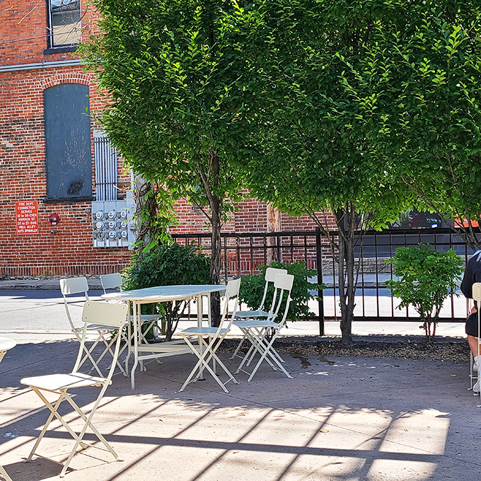 Outdoor seating that whispers, "Take your time, enjoy the sunshine." Urban dining with a side of vitamin D.