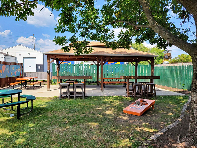 The outdoor pavilion offers a perfect summer sanctuary where picnic tables have hosted more family memories than most living rooms.