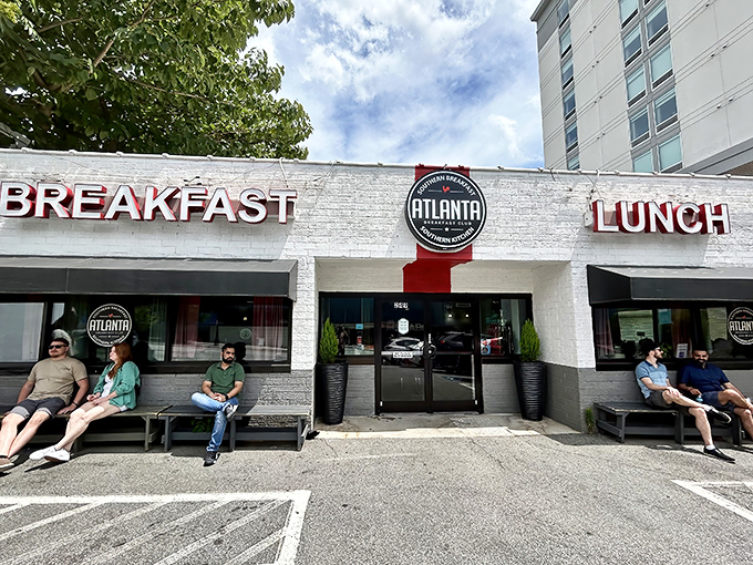 The wait becomes part of the experience. These benches have heard countless conversations about "how good this is going to be."