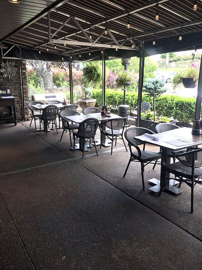 Outdoor dining that brings the garden party to breakfast. String lights overhead promise that pancakes taste even better with a gentle breeze.