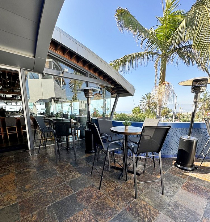 The outdoor patio offers fresh sea breezes, palm tree views, and the perfect setting for pretending everyday life doesn't exist.