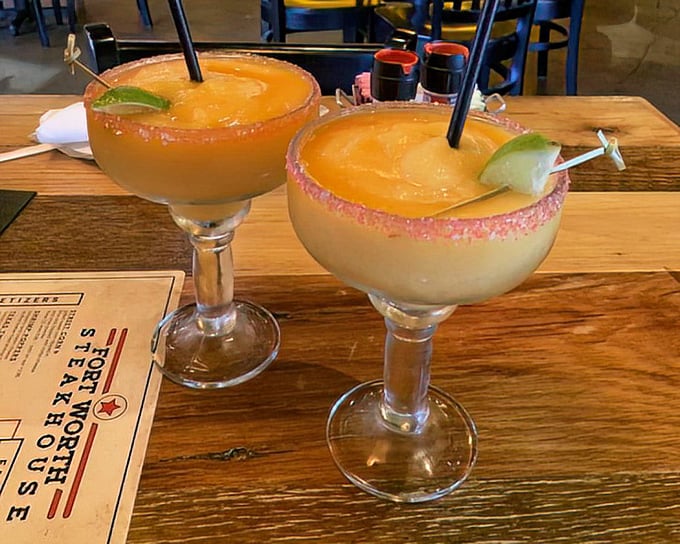 Peach margaritas with salt-rimmed glasses that promise to turn "I'll just have one" into "What time is it?"